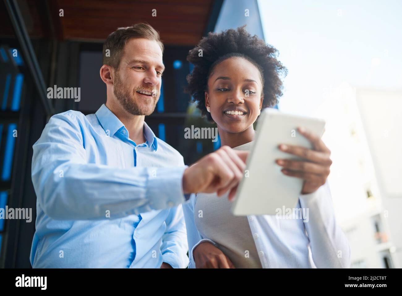 Two men standing talking outside hi-res stock photography and images ...