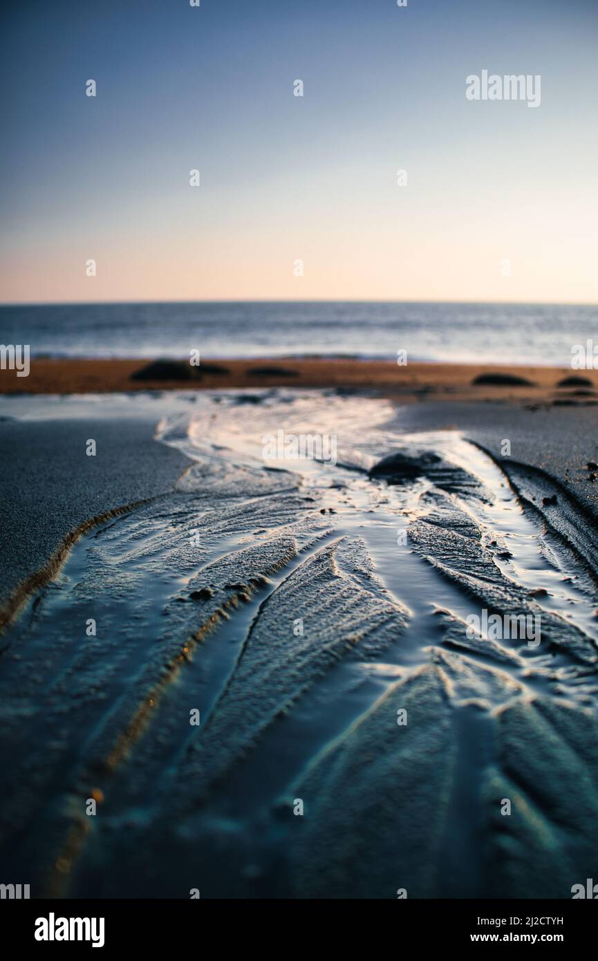 A vertical shot of the sand texture Stock Photo - Alamy