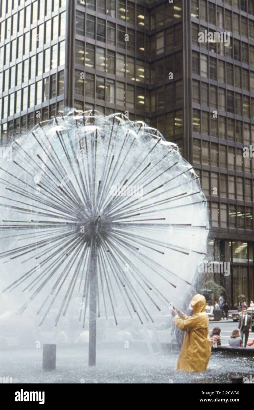 Man working on the Pinwheel water fountain. Rockefeller Center--6th ...