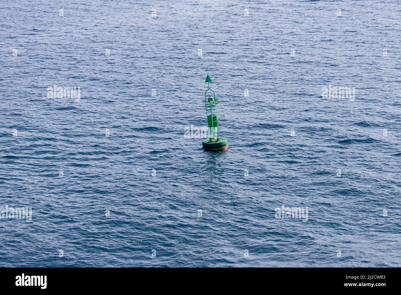 Green Lateral floating signal for boats Stock Photo - Alamy
