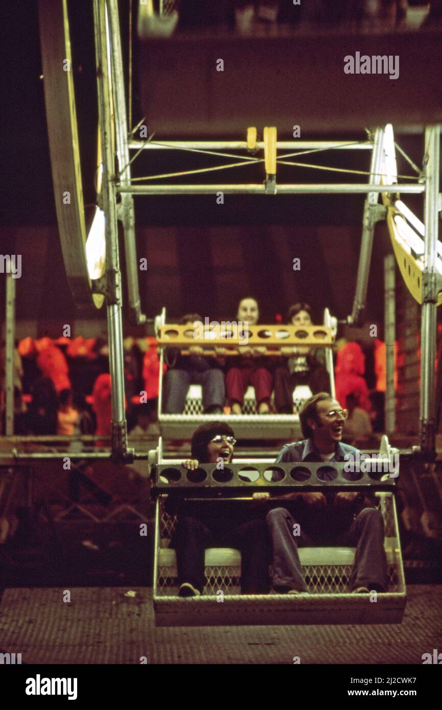 Fair goers riding the ferris wheel at the Alabama State Fair ca. 1972 ...