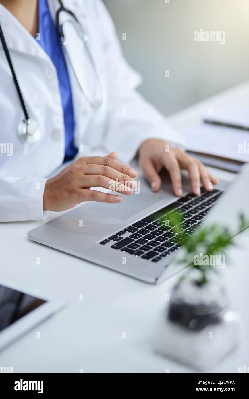 In charge of her medical practice. Closeup shot of a doctor working on ...