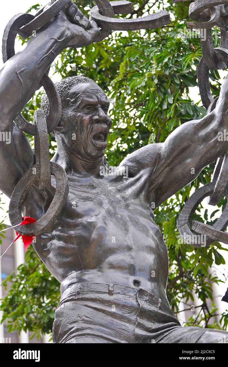 A vertical shot of the Zambian Freedom statue in front of the ...