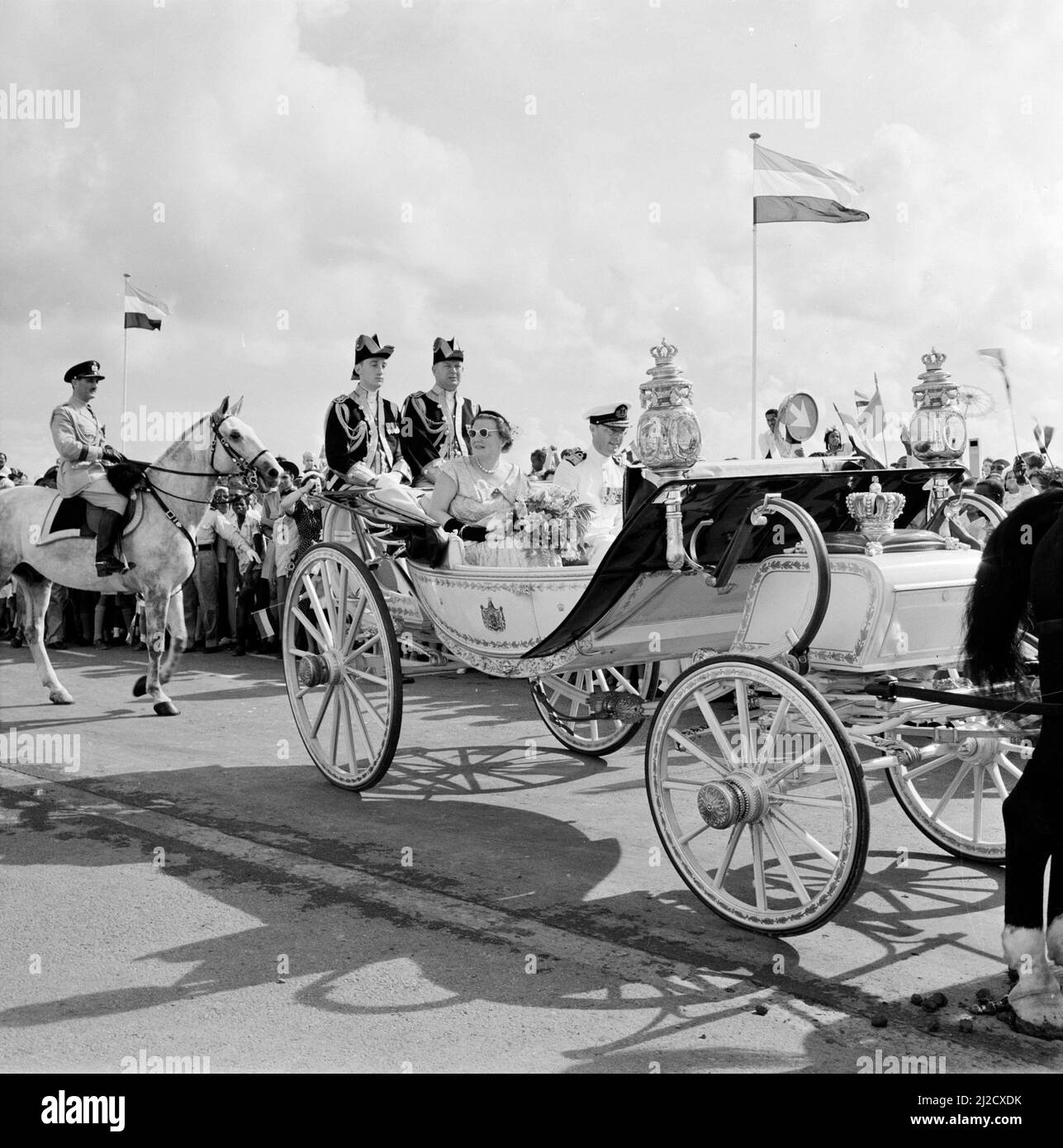 The royal couple in the calèche on the quay of Willemstad ca: October ...