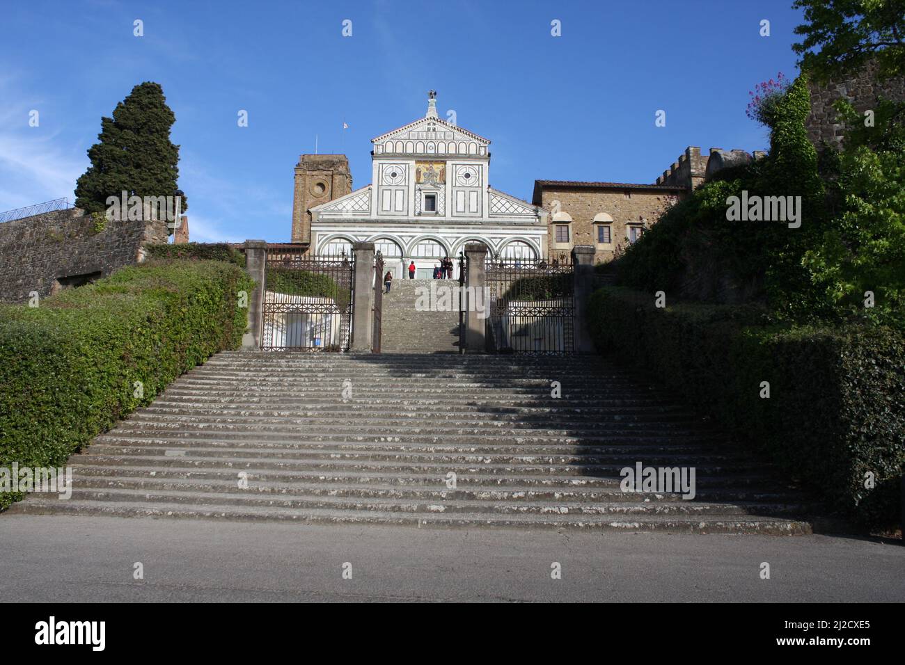 A beautiful perspective shot of the entrance gates of the Abbazia di ...