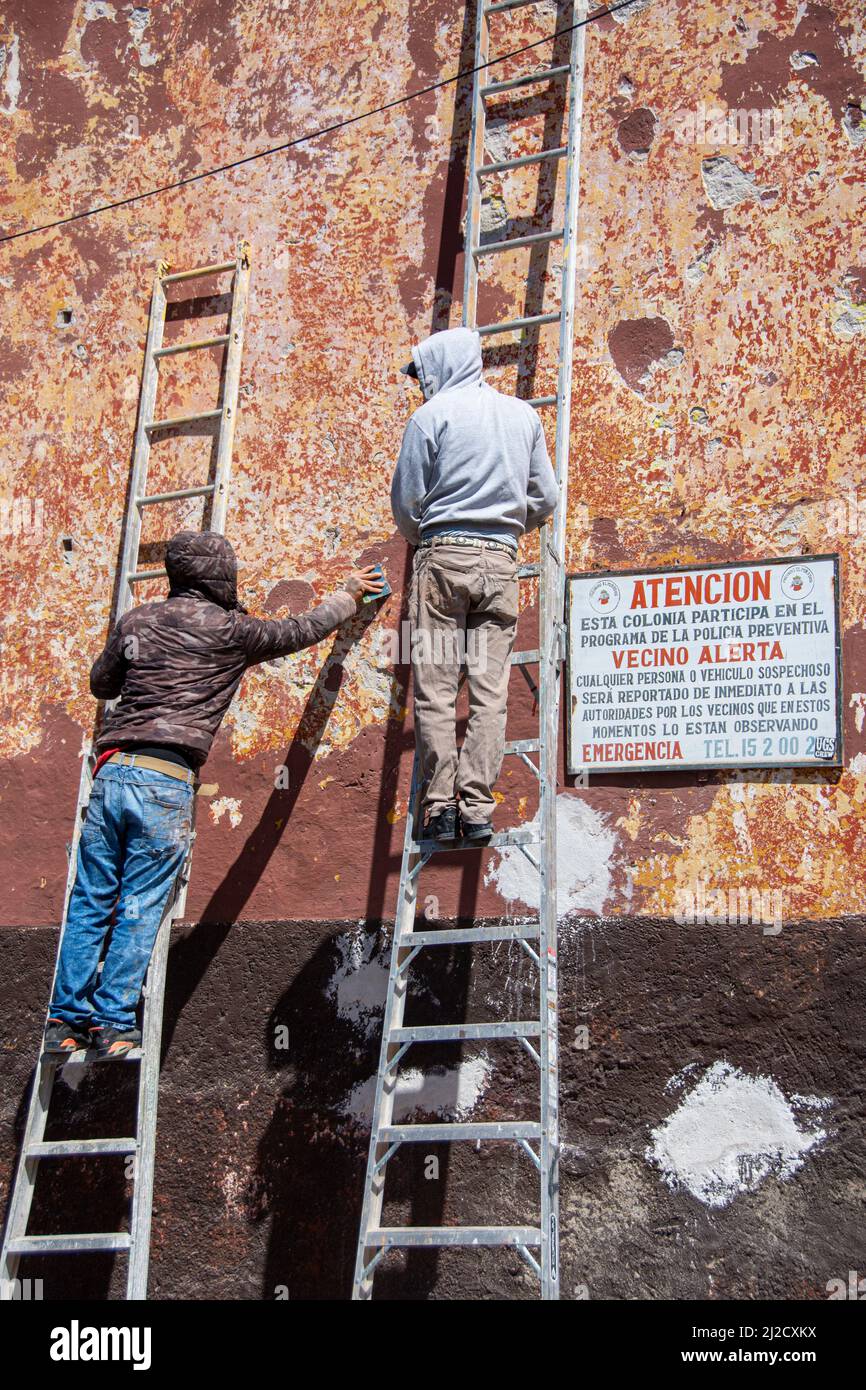 Several Mexican construction workers working on a building. San Miguel ... Several Mexican construction workers working on a building. San Miguel ...