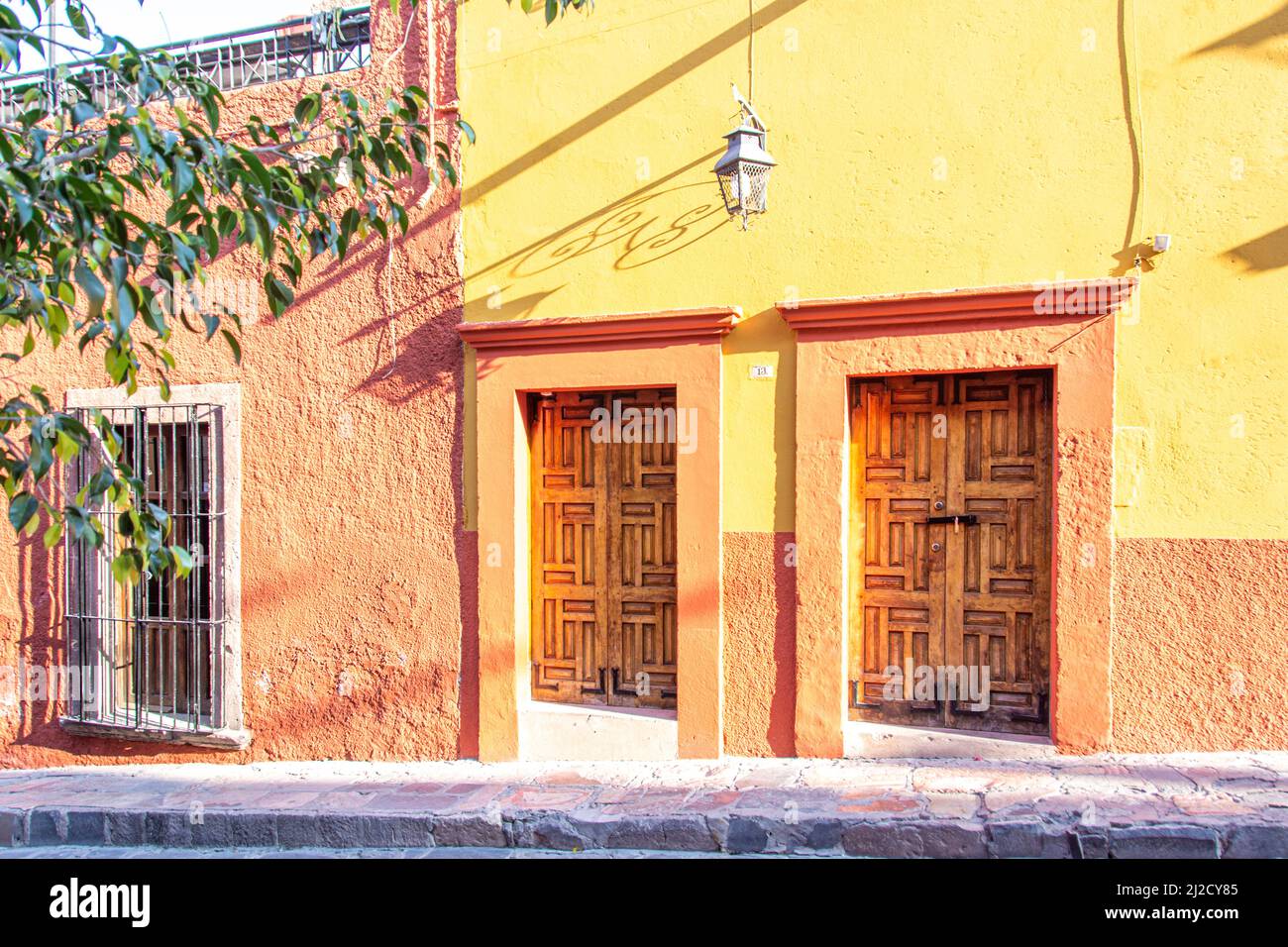 Two buildings connected adjacent together color colour hi-res stock ...