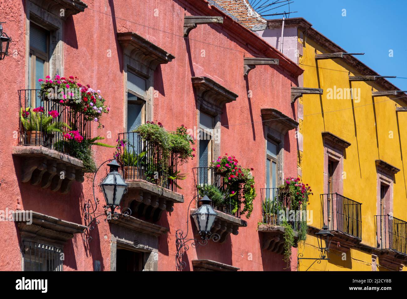 Two buildings connected adjacent together color colour hi-res stock ...