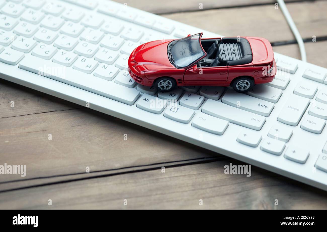 red car on the keyboard Stock Photo - Alamy