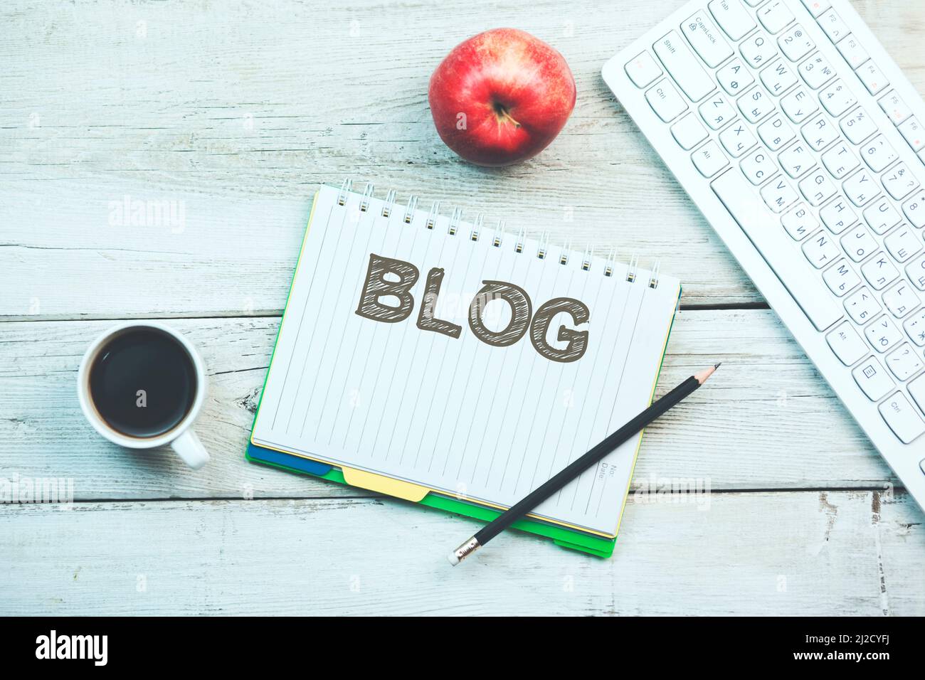 blog word on notepad with keyboard,apple and coffee on desktop Stock ...