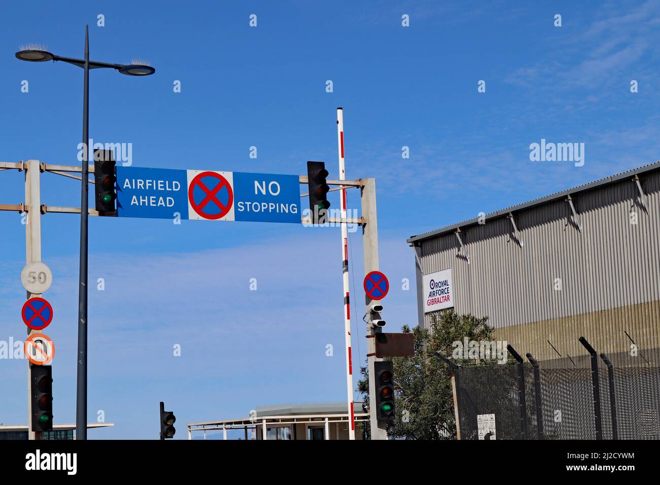 Road sign in Gibraltar where road traffic crosses the airport runway ...
