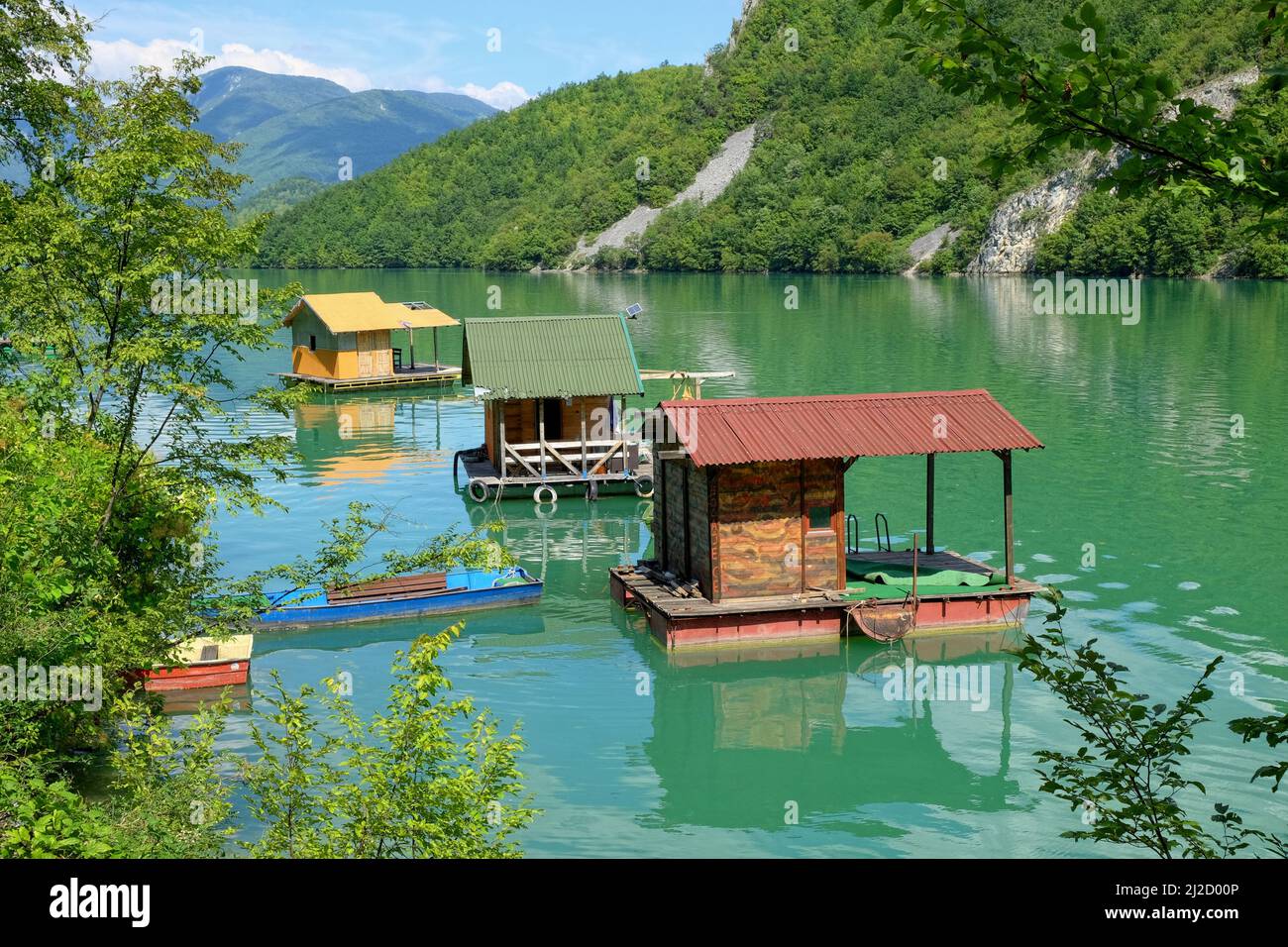 three floating houses on Drina River, Serbia Stock Photo - Alamy