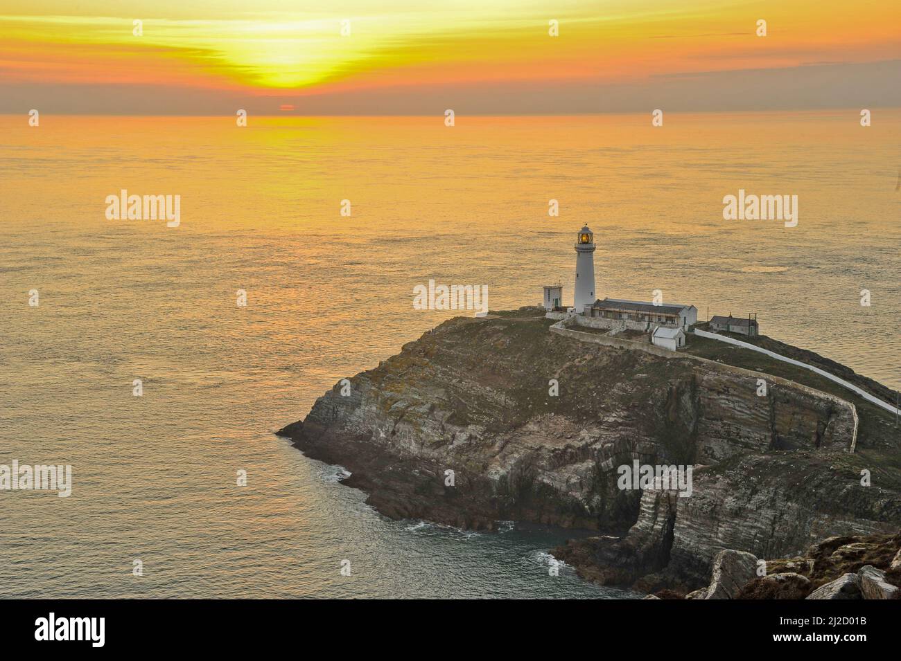 Sunset over South Stack, Anglesey Stock Photo - Alamy