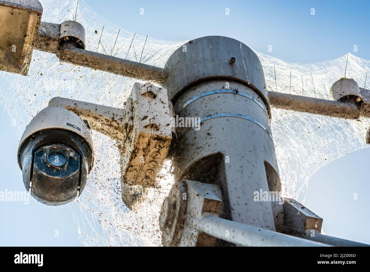 Plock, Poland - August 12, 2021. Spiders nets covering city lights and ...