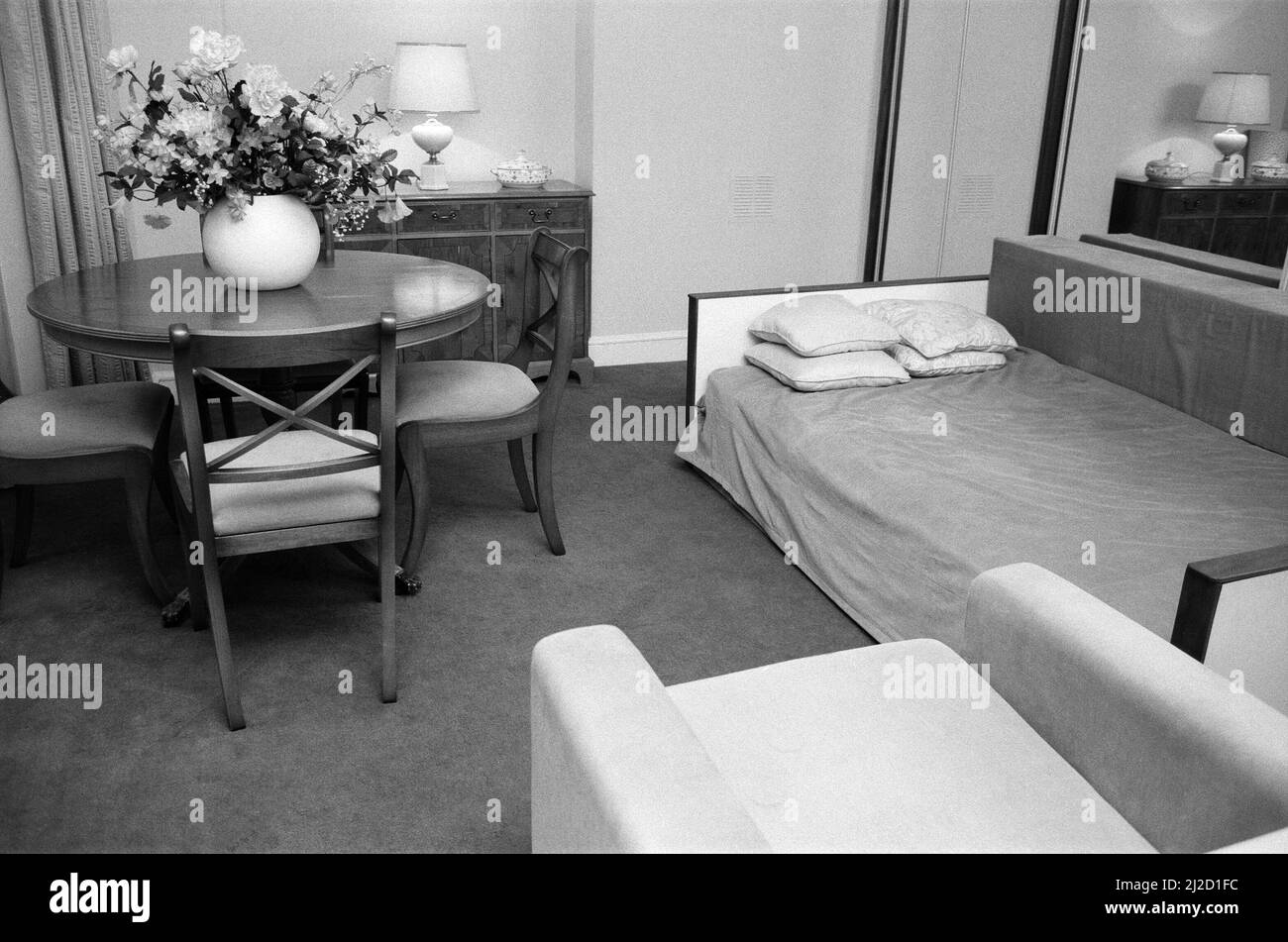 Interior view of a flat, showing the living room area and sofa bed ...