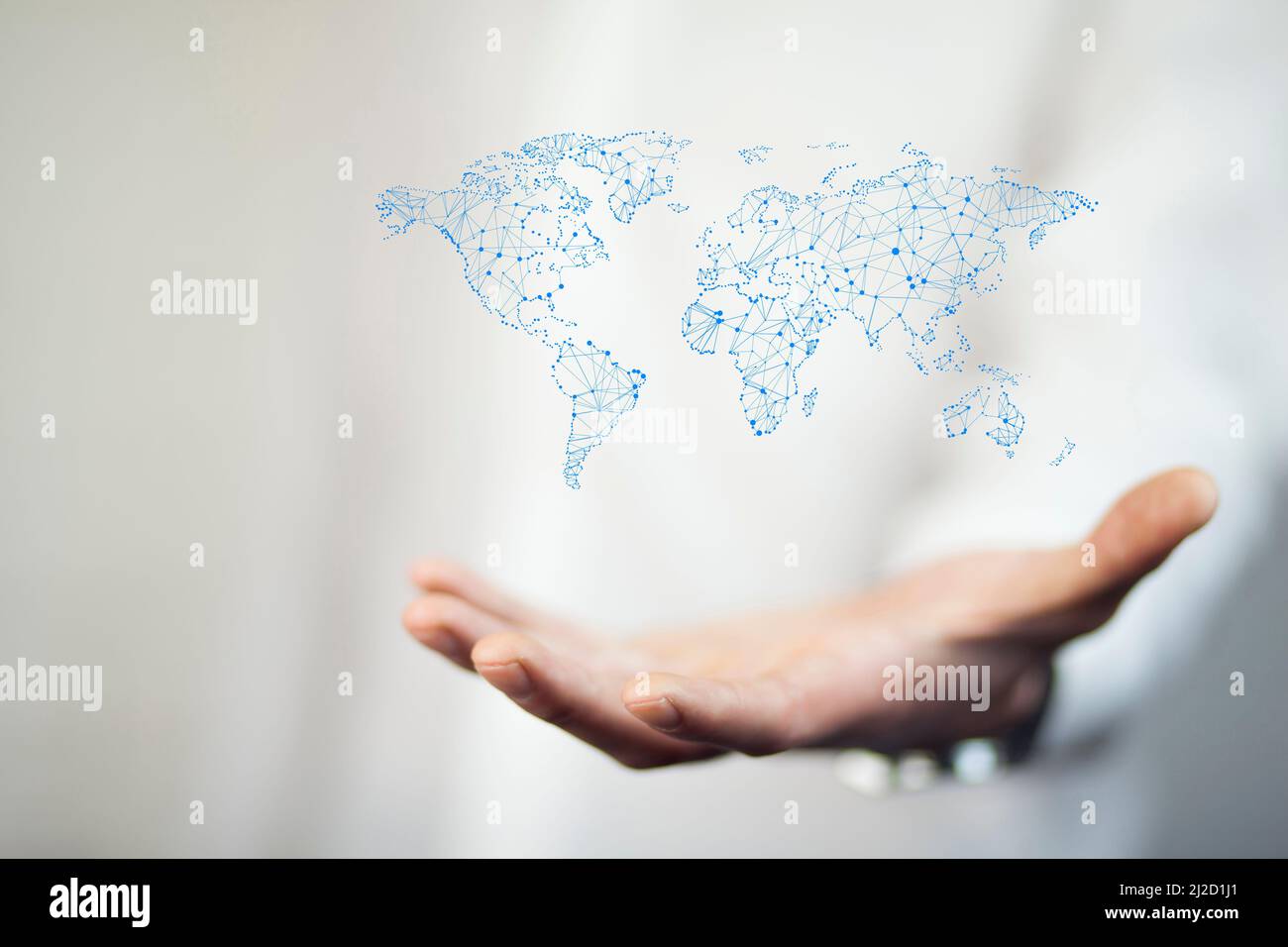 businessman holding world map in hands Stock Photo - Alamy