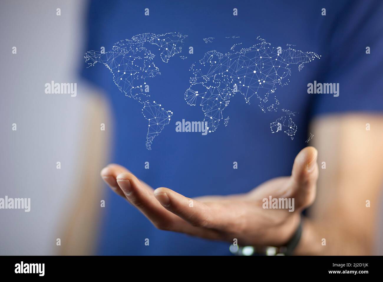 businessman holding world map in hands Stock Photo - Alamy
