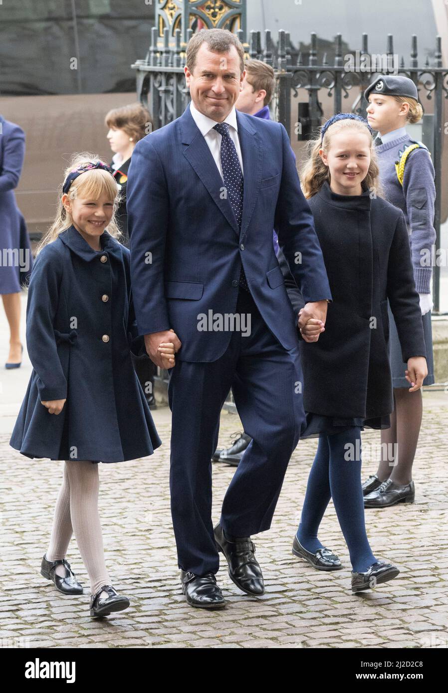 London, UK. 29 March, 2022. Peter Phillips with daughters Savannah ...