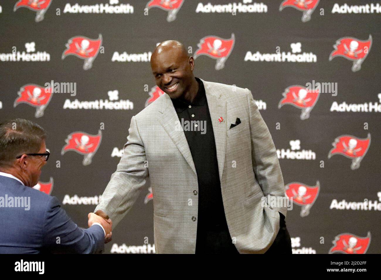 March 31, 2022, Tampa, FL, USA: Tampa Bay Buccaneers General Manager Jason Licht, left ...