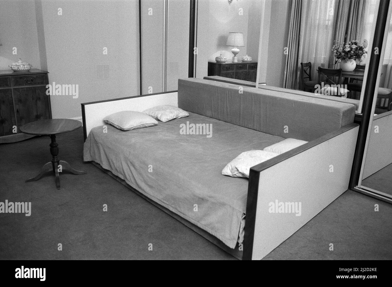 Interior view of a flat, showing the living room area and sofa bed ...