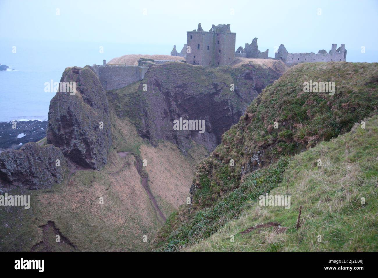 A natural view of the famous Dunnottar castle and mountain landscape in ...