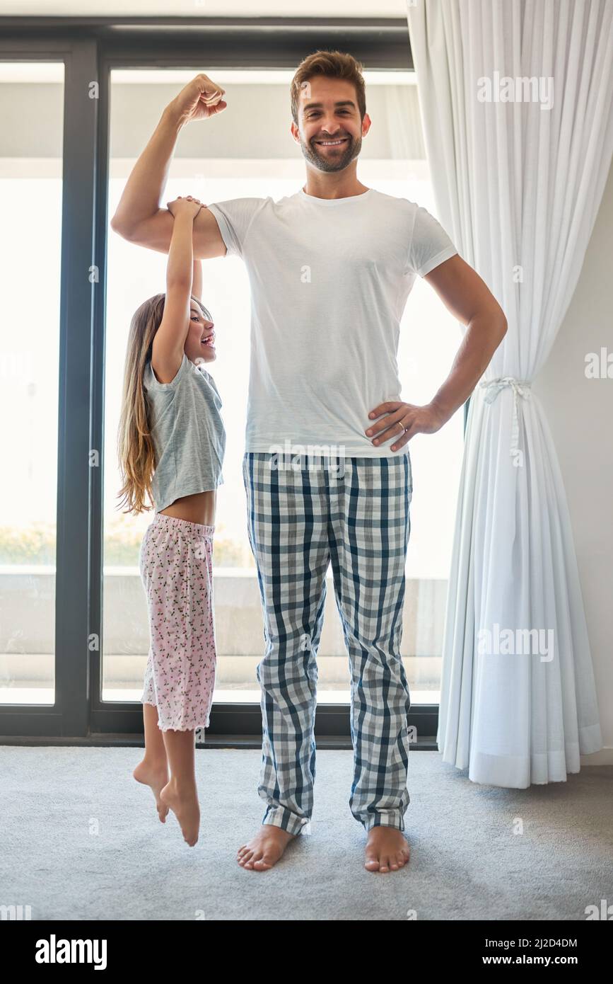 Shes always on my arm. Full length shot of an adorable little girl ...