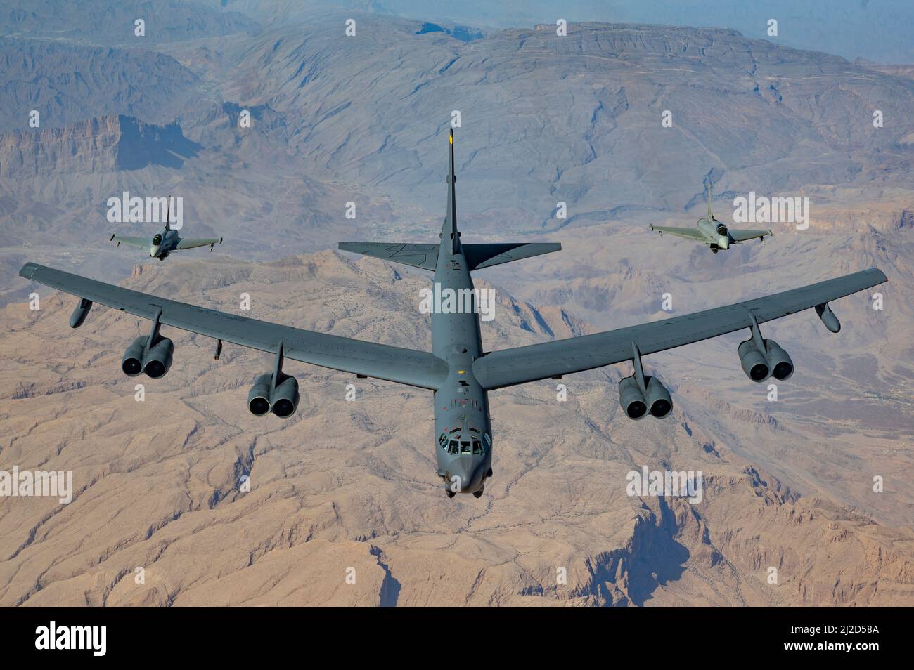 A U.S. Air Force B-52H Stratofortress flies alongside Royal Air Force ...
