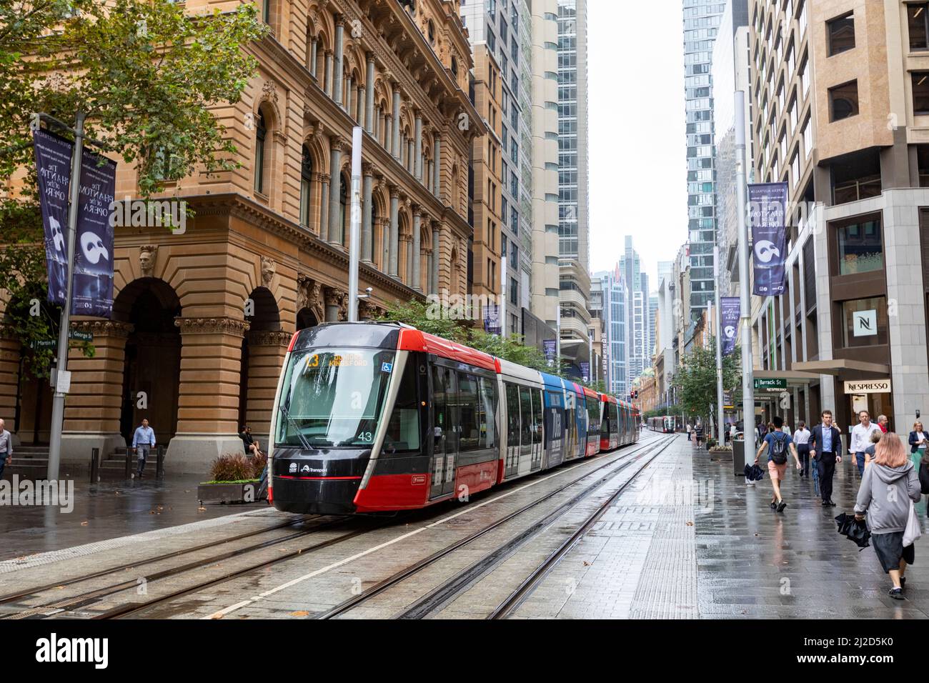 Sydney light rail train travelling along George street in the city ...