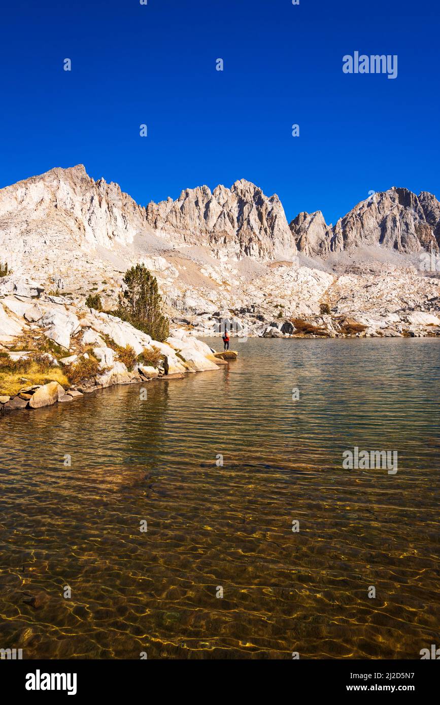 Hiker in Dusy Basin under the Palisades, Kings Canyon National Park ...