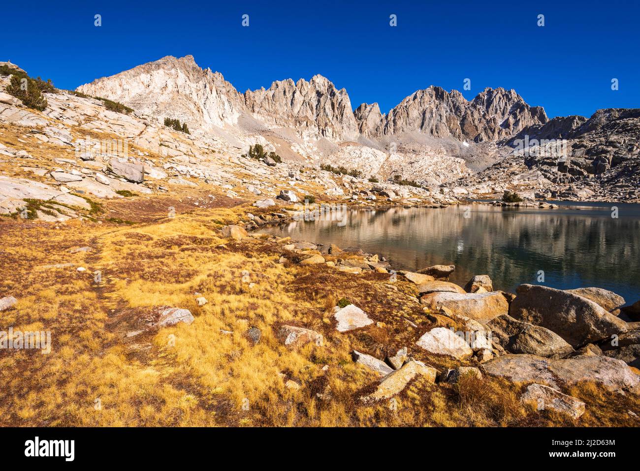 The Palisades above alpine tarn in Dusy Basin, Kings Canyon National ...