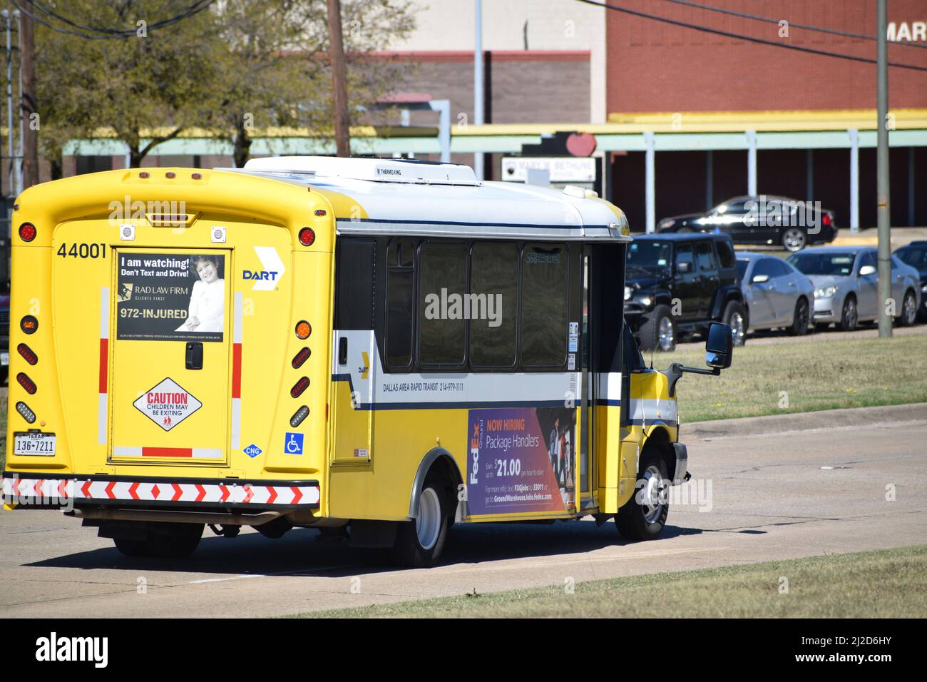Small yellow Dallas Area Rapid Transit bus - October 2021 Stock Photo ...