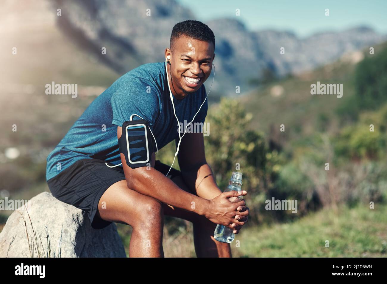 Handsome man looking back running hi-res stock photography and images ...