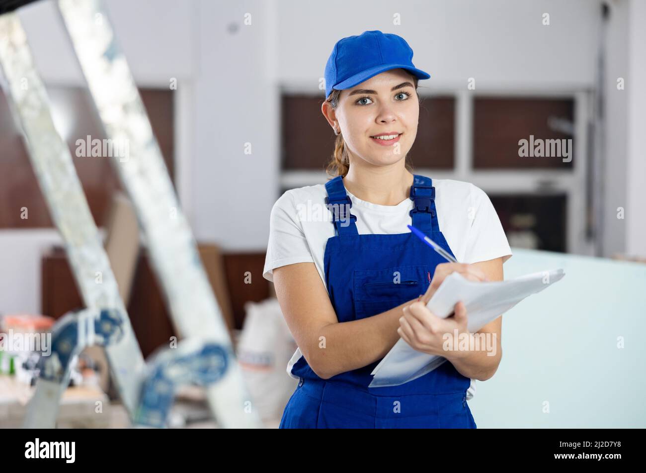 Woman filling checklist pen hi-res stock photography and images - Alamy