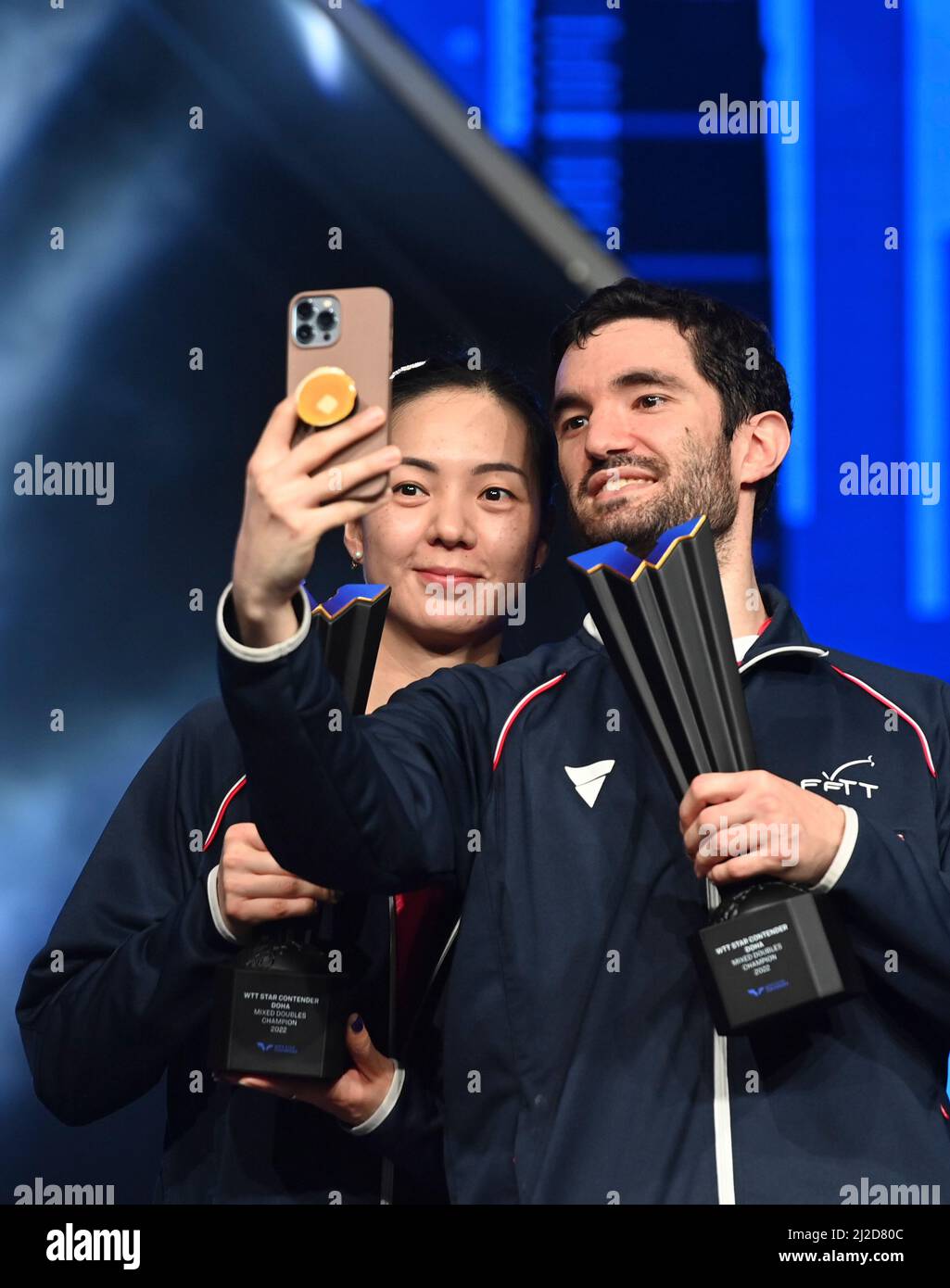 Doha, Qatar. 31st Mar, 2022. Yuan Jianan (L)/Emmanuel Lebesson of ...