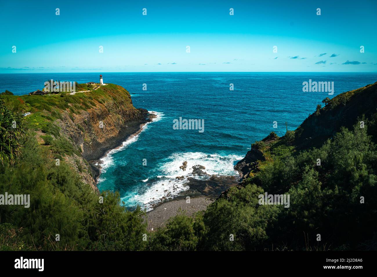 lighthouse on island coast Stock Photo - Alamy