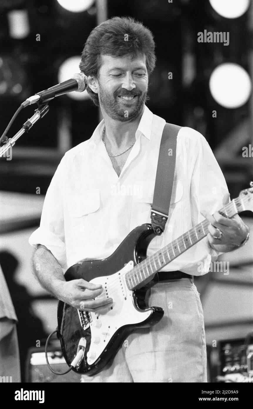 Eric Clapton performing on stage at the John F. Kennedy Stadium, Philadelphia, during the Live ...