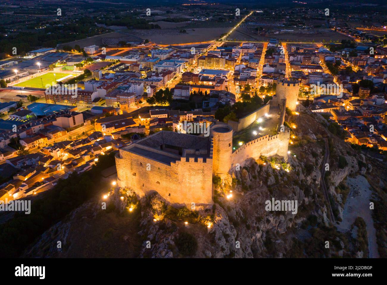Evening aerial view of town of Castalla and the medieval castle. Spain ...