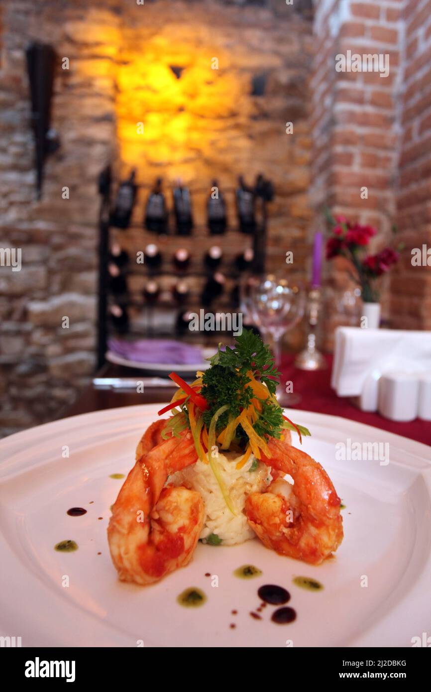 Shrimps and rice in the dinner plate Stock Photo - Alamy