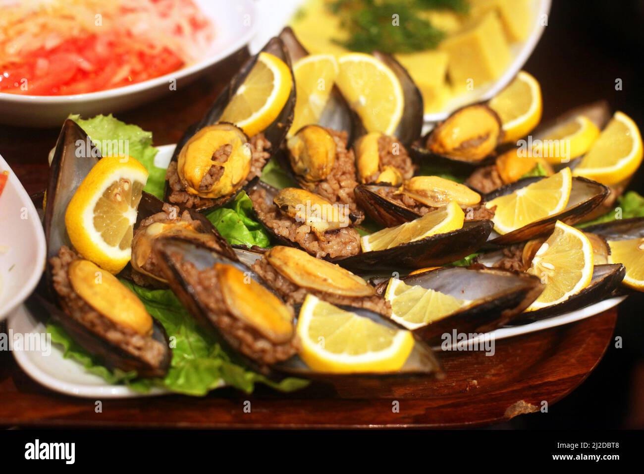 Stuffed mussels lemon hi-res stock photography and images - Alamy