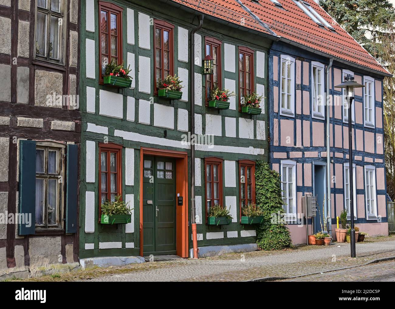 Templin, Germany. 30th Mar, 2022. Half-timbered houses in the ...