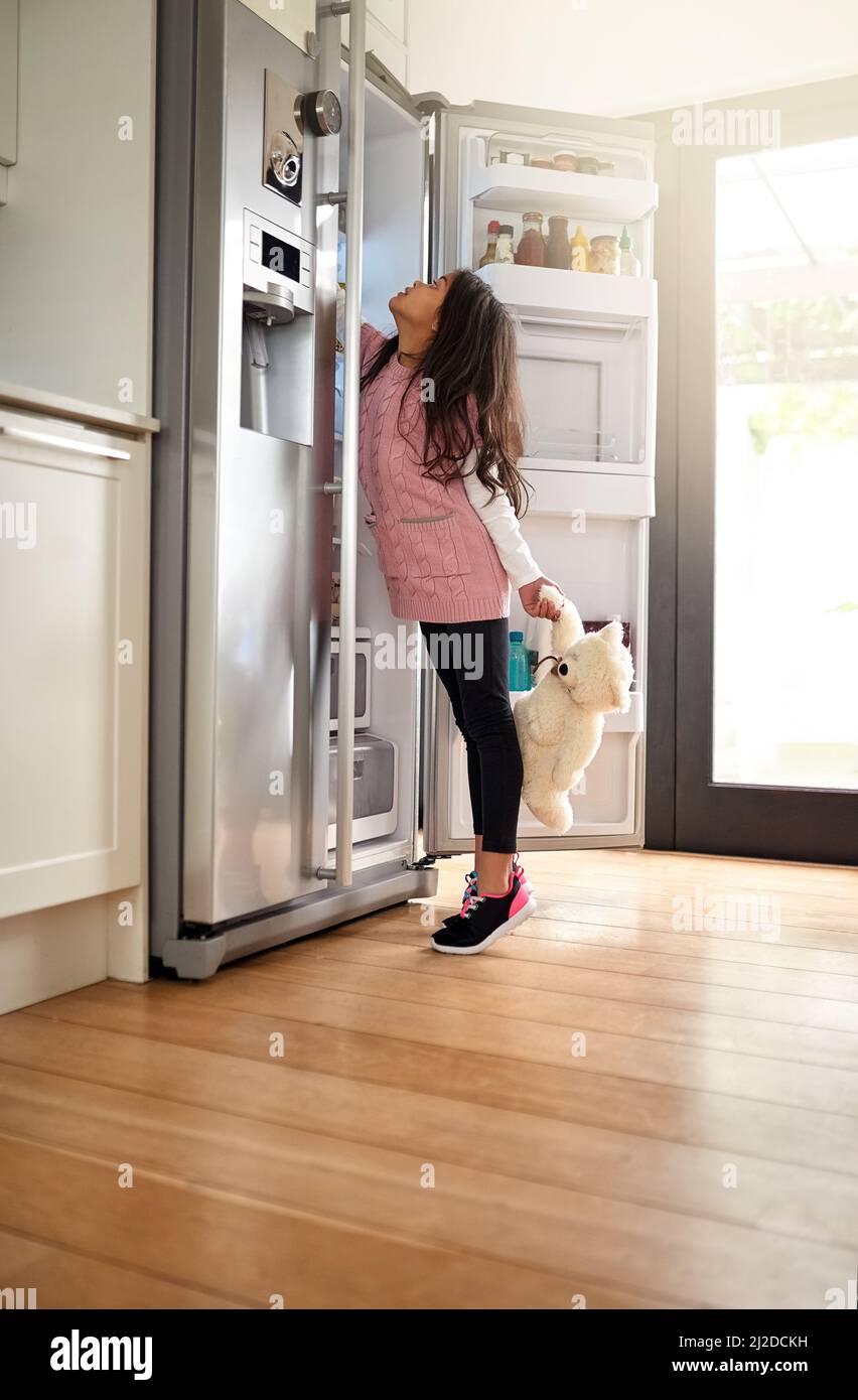 Child home alone fridge hi-res stock photography and images - Alamy