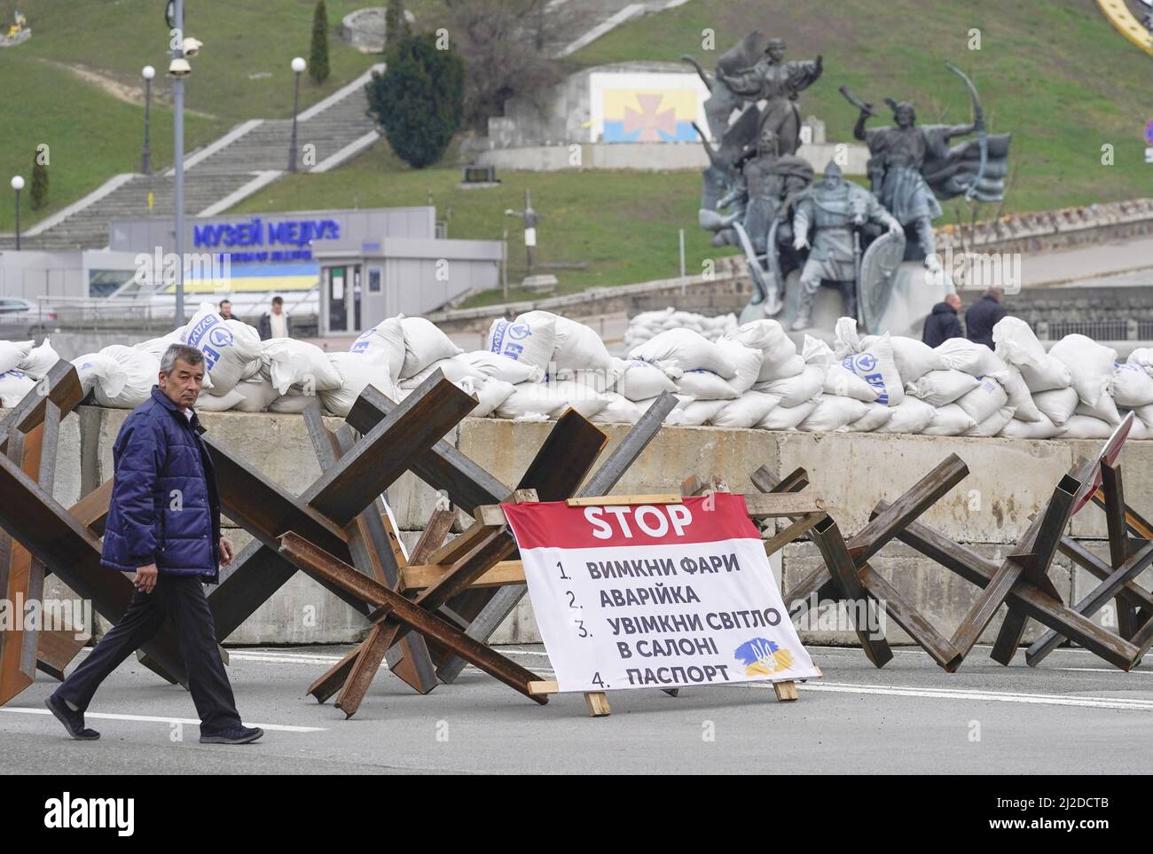 Photo taken on March 31, 2022, shows a makeshift checkpoint set up with ...