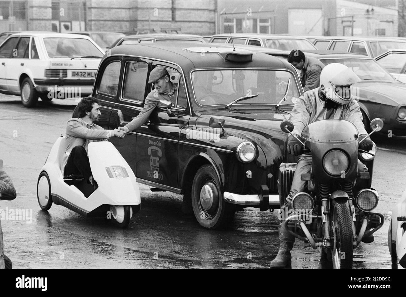 The New Electric Vehicle Picture shows a gentleman in London driving ...