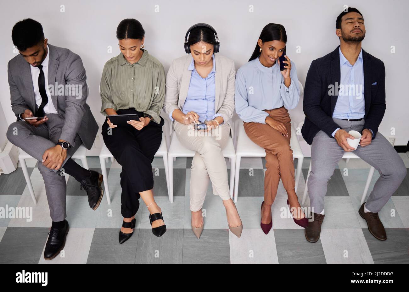 Today is the first day of our future. Shot of a group of business ...