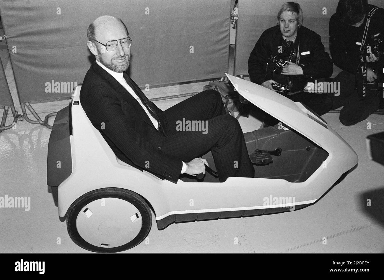 The New Electric Vehicle Sir Clive Sinclair in his new electric vehicle ...