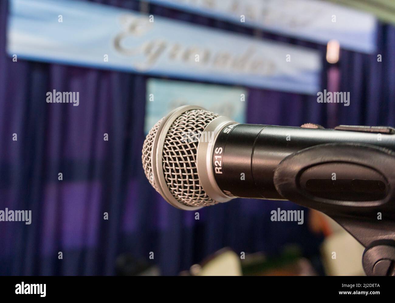 Focus on microphone, ready for and event Stock Photo - Alamy