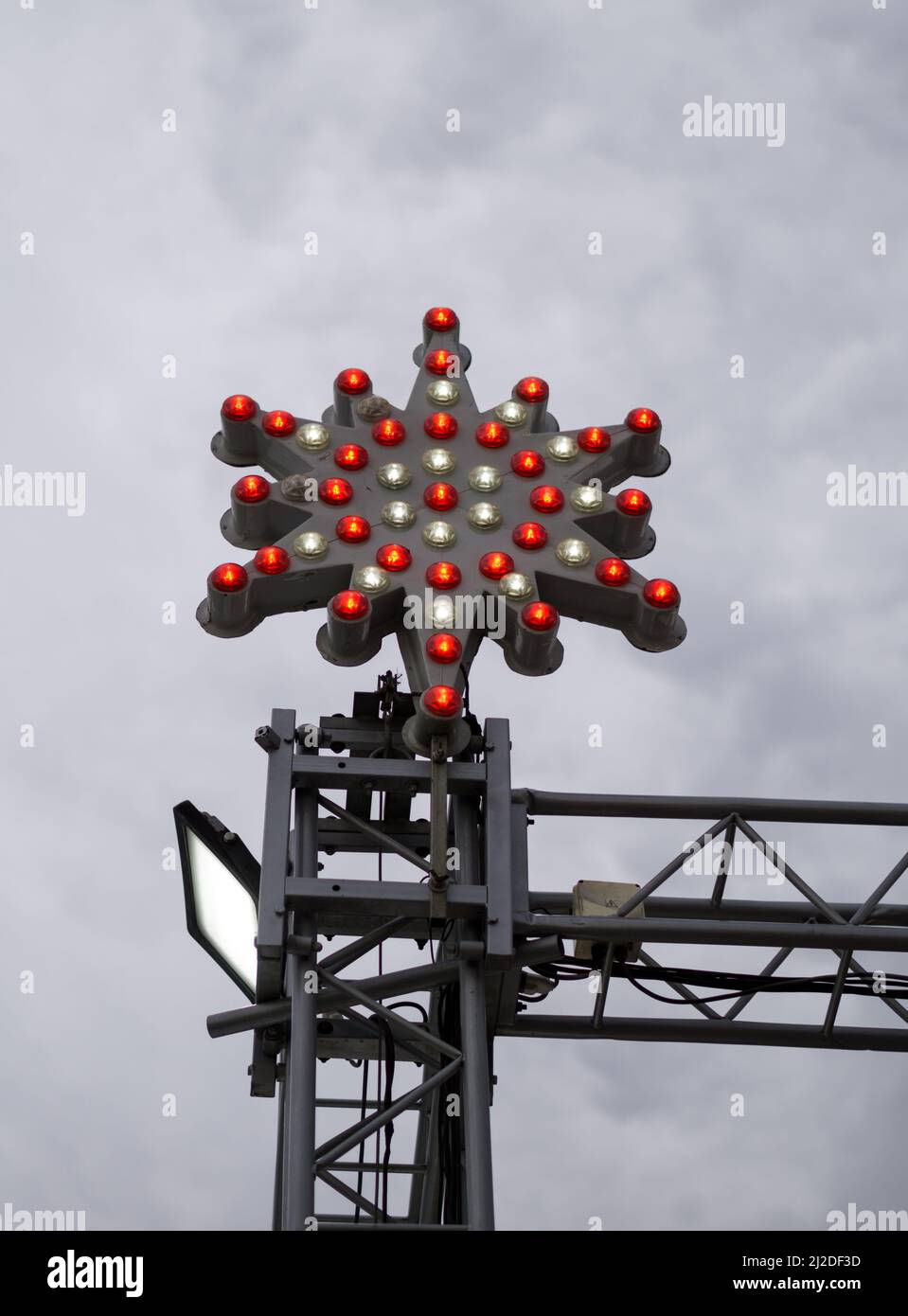 Decorative light in a fair, star shaped Stock Photo - Alamy