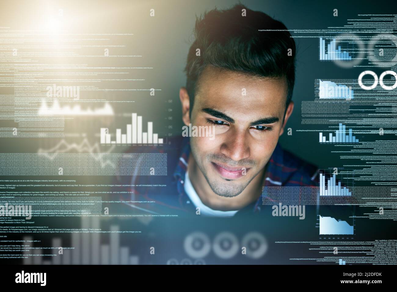 He puts the pro in programmer. Sshot of a young computer programmer working on source code Stock ...