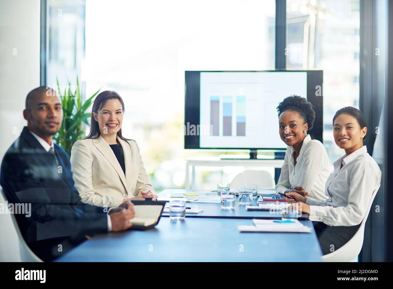 We know that hard work pays off in the end. Portrait of a group of ...