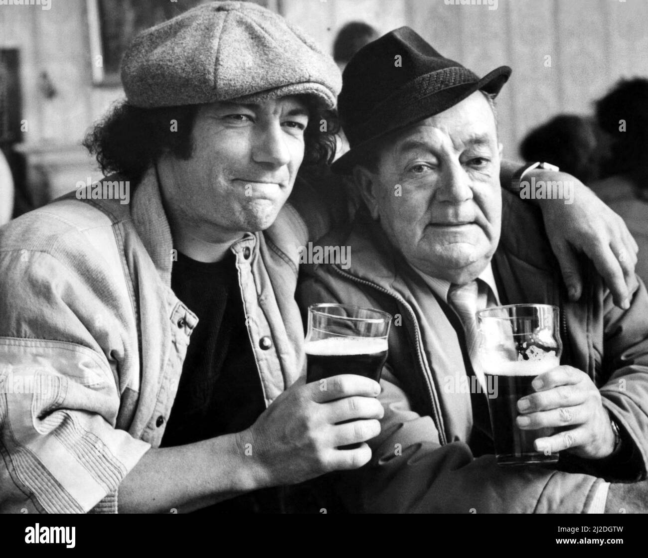 Brian Johnson lead singer of the rock group AC/DC shares a pint of beer ...